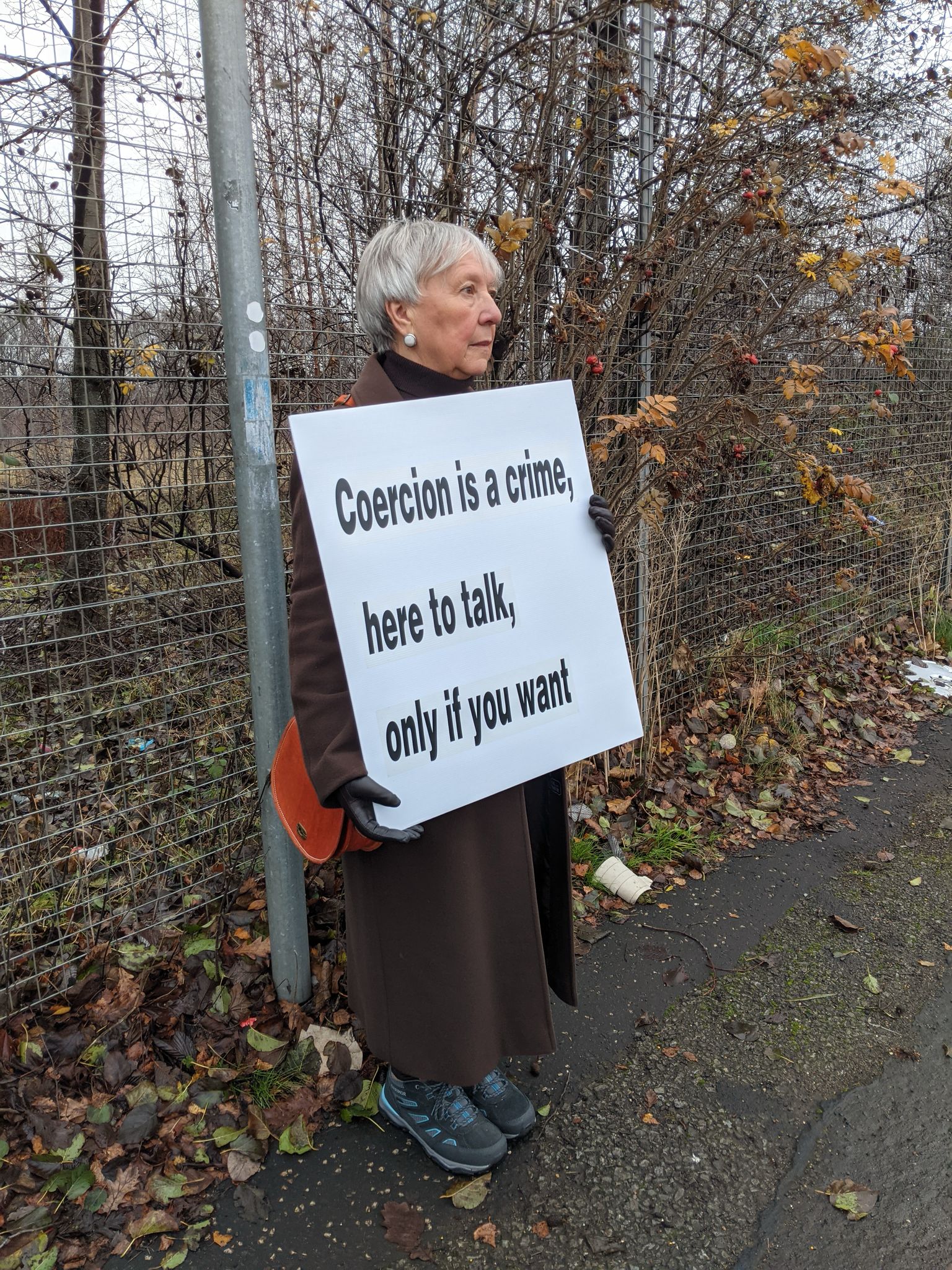 Court hearing for grandmother arrested after holding sign in abortion ...