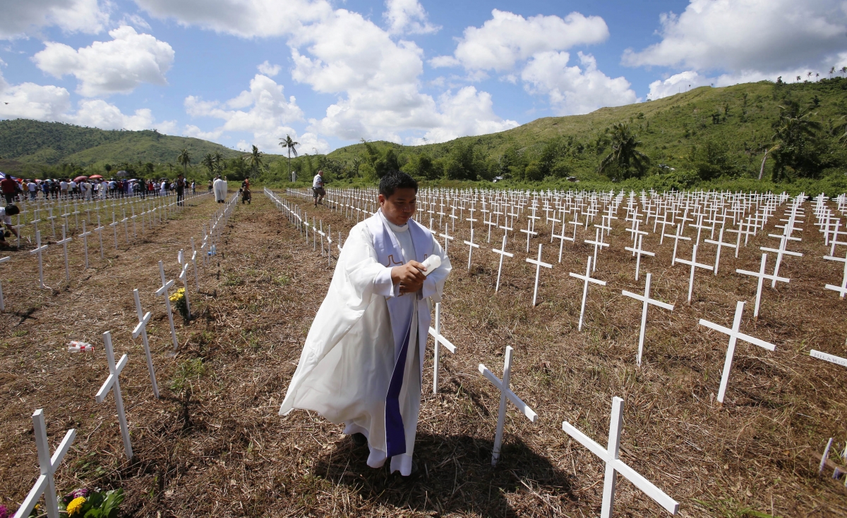 Church bells toll as Philippines remembers thousands killed a year ...
